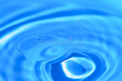 137 One Or More Drops Of Water Splashing Into Waves And Undefined