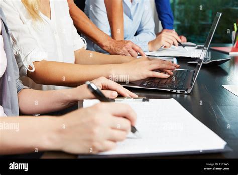 Hands Working On Tablet And Laptop Computer In The Office Stock Photo Alamy