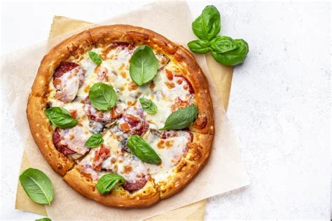 Pizza With Spicy Salami Sausage Mozzarella Cheese Tomato Sauce And
