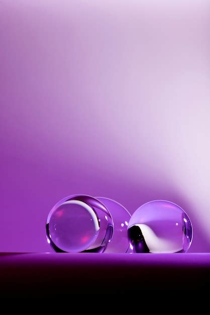 Free Photo Crystal Balls With Purple Background
