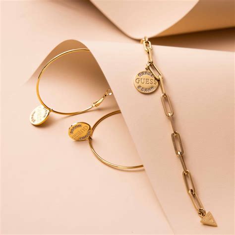 Guess Stalen Goldplated Oorringen Guess Logo 50mm Voor Dames Lucardi NL