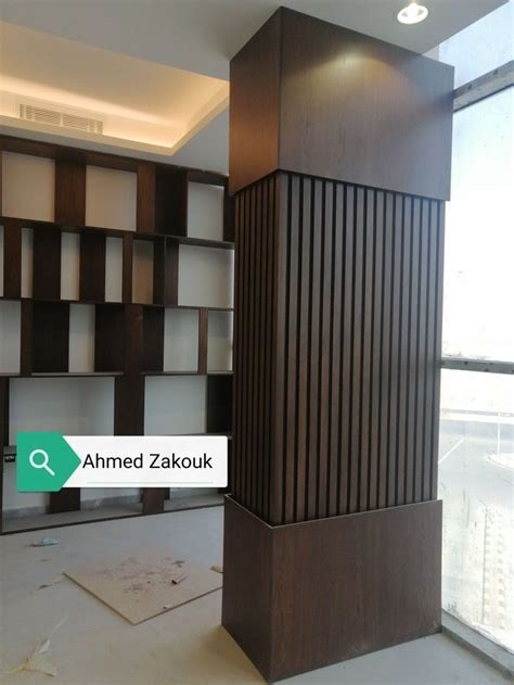 The Interior Of An Office Building With Wood Paneling On The Walls And