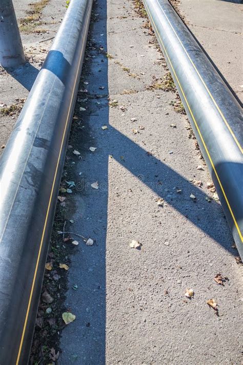 New Water Pipes After Replacement Near The Old House Pipeline Stock
