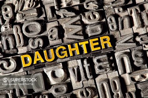 Old Lead Letters Forming The Word DAUGHTER SuperStock