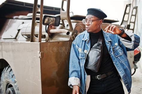 African American Man In Jeans Jacket Beret And Eyeglasses Stock Image