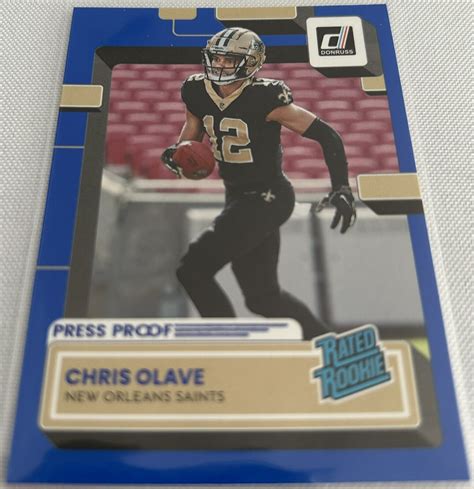 2022 Panini Donruss Rated Rookie Press Proof Blue 309 Chris Olave