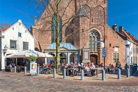 People Enjoying A Sunny Spring Day On A Dutch Terrace Editorial Stock