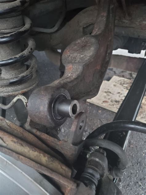other end of this upper link is angled and won't line up with the holes. how can I twist the ...