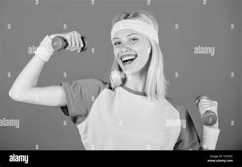Girl Exercising With Dumbbell Fitness Instructor Hold Little Dumbbell