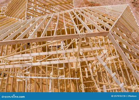In The Process Of Constructing The Roof Beams For A New House Based On