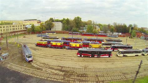 Modern And Old Trams In Parking Lot Above Stock Footage Video Of Office Cloudy 321686984