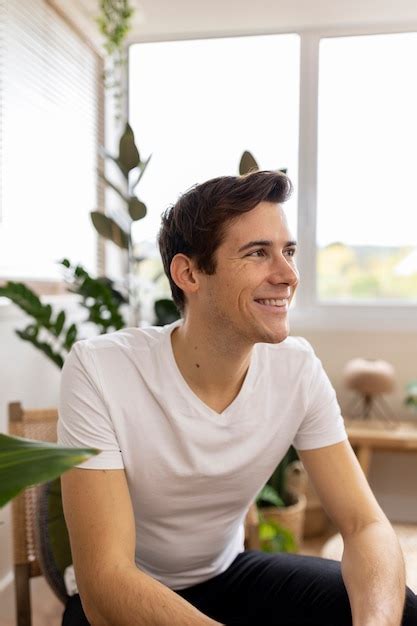 Free Photo Young Man Smiling While Having A Great Time