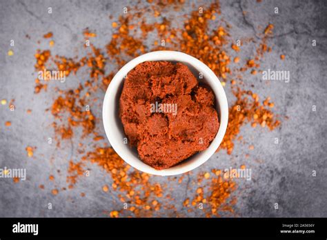 Curry Paste Cayenne Pepper And Dried Chilli Peppers Background Group
