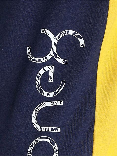 Buy Men Sun Ray Yellow Printed One8 Virat Kohli Color Block T Shirt