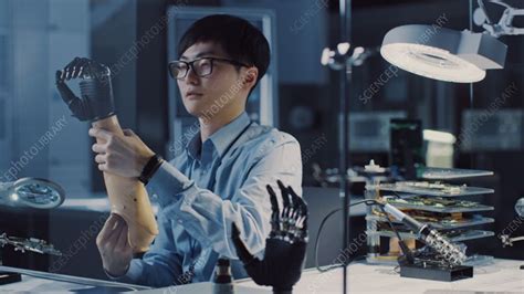 Engineer Testing Prosthetic Robot Arm Stock Video Clip K010 6175
