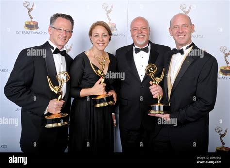 From Left John Janavs Heidi Miller Kevin Lewis And Robert Frye Pose
