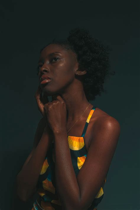 Woman In Blue And Yellow Bikini Top Photo Free Melanin Image On Unsplash
