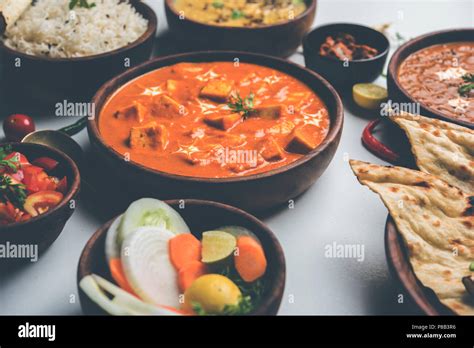 Assorted Indian Food For Lunch Or Dinner Rice Lentils Paneer Dal