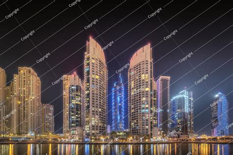 Night Time Panoramic View Of Dubai Marina Bay And City Center Uae
