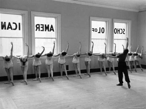 Dancers At George Balanchines School Of American Ballet Lined Up At Barre During Training