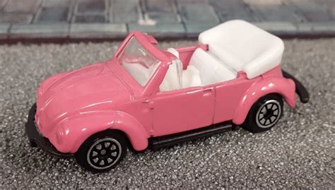 Pink Volkswagen Beetle Convertible