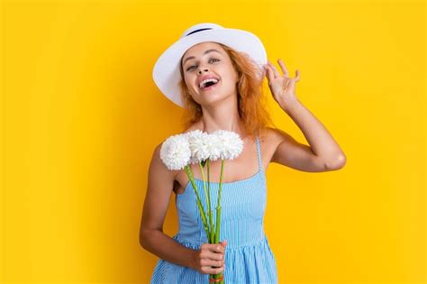 Premium Photo Glad Girl With Womens Day Flowers Isolated On Yellow