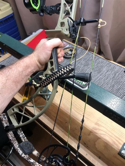 Tan risers with custom strings | Archery Talk Forum