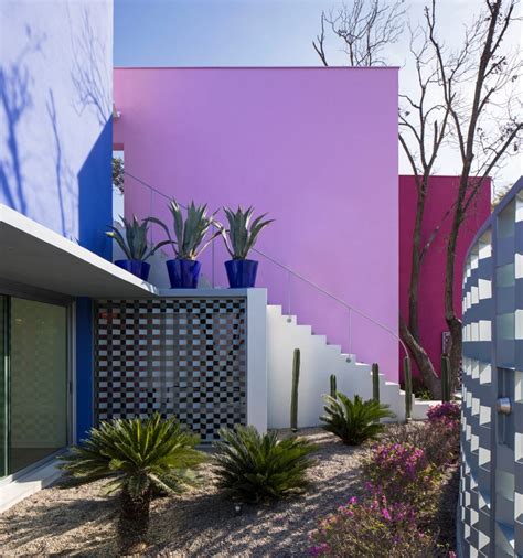 Colourful Barragán esque house by Moneo Brock wraps four trees