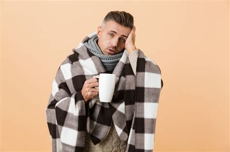 Premium Photo Portrait Of A Sick Man Wrapped In A Blanket Standing