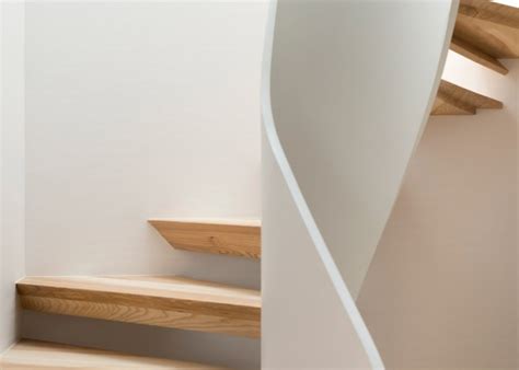 Twisted Staircase Features In Renovation By 51 Architecture