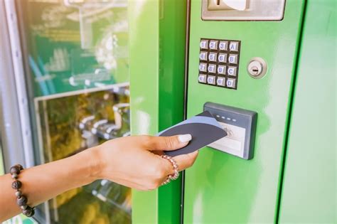 Premium Photo The Girl Buys Goods At A Retail Automated Kiosk And