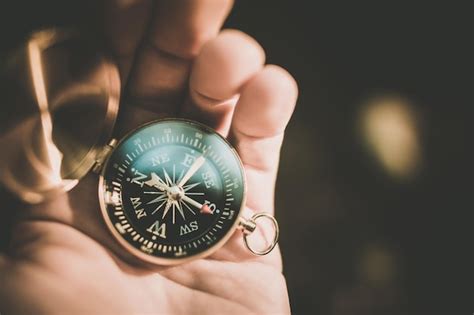 Premium Photo Trail Compass In A Hand
