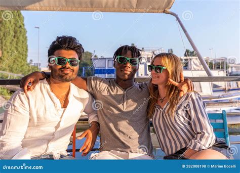 Small Group Of Multiethnic Friends Having Fun On Summer Vacation On A