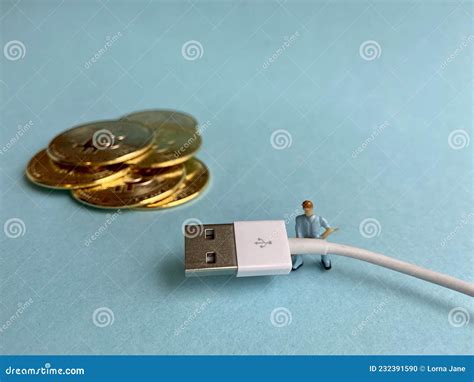 Bitcoin Crypto Currency Mining Concept Energy And Electricity Use With Usb Charger Symbolising