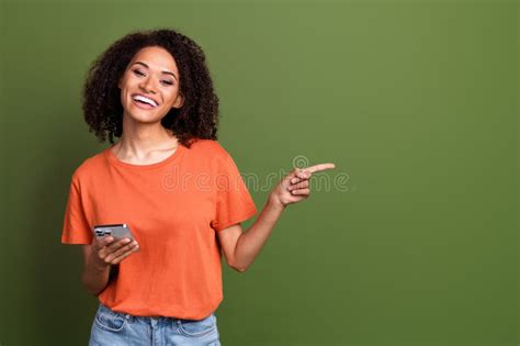 Photo Of Excited Sweet Woman Wear Orange T Shirt Texting Modern Gadget