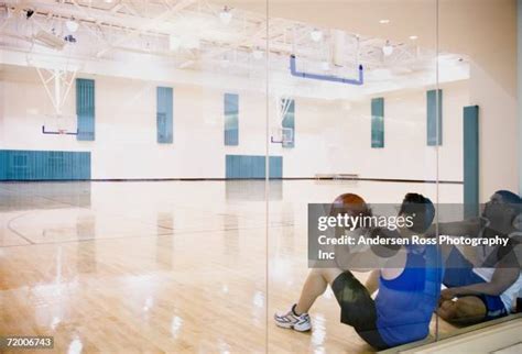 Basketball Sitting On Court Photos And Premium High Res Pictures