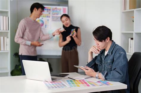 Creative Workflow And Inspiration A Graphic Design Team Collaborating
