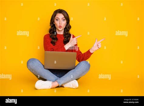 Photo Of Attractive Shocked Lady Sit Floor Legs Crossed Work Computer