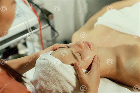 Beautiful Caucasian Woman Having Facial Massage At Spa Close Up