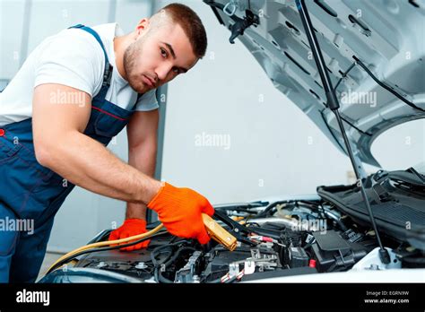 Car Mechanic At The Service Station Stock Photo Alamy