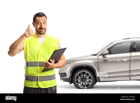 Road Assistance Worker Holding A Clipboard And Gesturing A Phone Call