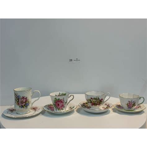 Assorted Floral Tea Cups And Saucers