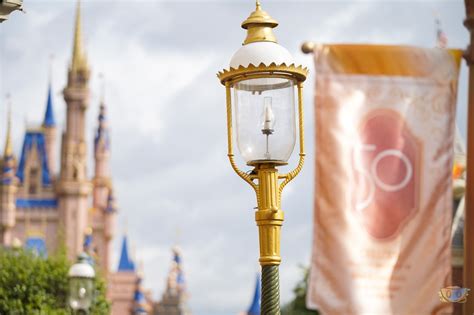 Main Street Usa Lampposts Receive Touch Of Gold For Disney World 50th