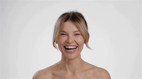 Happy Aging Carefree Middle Aged Woman With Bare Shoulders Laughing To