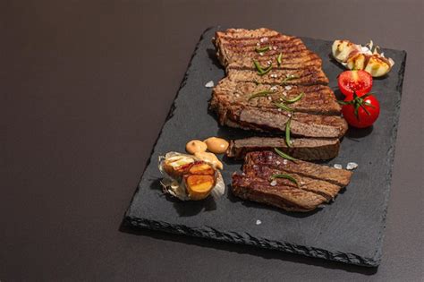 Premium Photo Well Done Roasting Veal Steak With Sauce Rosemary And