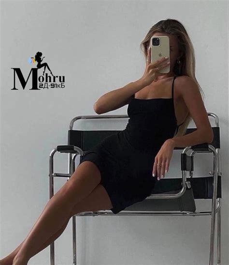 Платье вечернее Элегантное чёрное мини платье с завязочками на открытой спинке и бретельками на