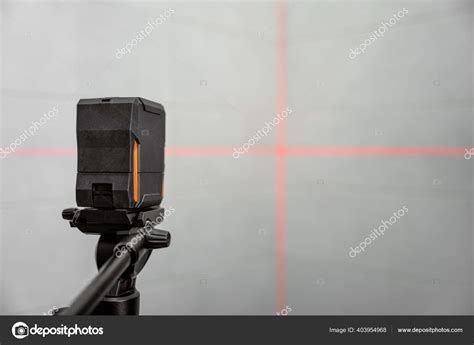 Electronic Laser Ruler Measures Center Level And Straight Line On Tile