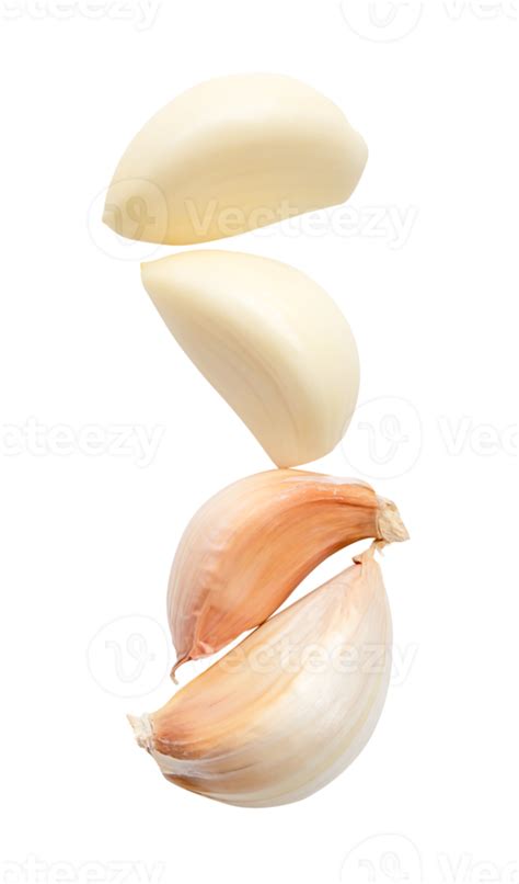 Top View Set Of Peeled And Unpeeled Garlic Cloves Isolated With