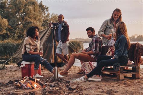 Happy To Travel Together Group Of Young People In Casual Wear Smiling