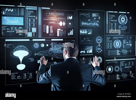 Attentive Specialist Touching The Icons On The Screen While Working